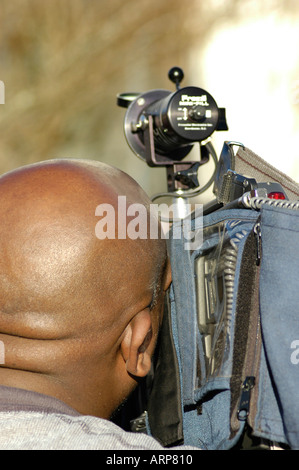 Television cameraman, black photojournalist in Atlanta, FOX at event ...