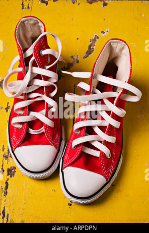 Pair of Red Children's Shoes on a White Background Stock Photo - Alamy