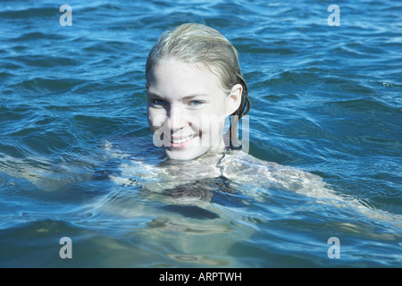 Woman swimming in the sea, Sweden Stock Photo - Alamy