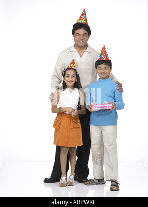 Boy wearing dunce cap in corner Stock Photo - Alamy