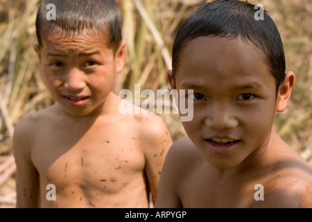 Lao boys after swiming Muang Long Laos Stock Photo - Alamy