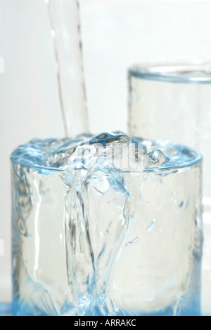 Mineral water falling Stock Photo - Alamy
