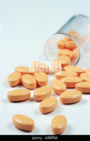 Oval shape Pharmaceutical medicine tablet on a Blue background,Medicine ...