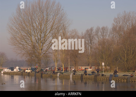 Fishing Match At Beccles Quay In Winter in the uk Stock Photo - Alamy
