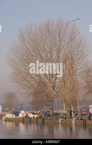 Fishing Match At Beccles Quay In Winter in the uk Stock Photo - Alamy