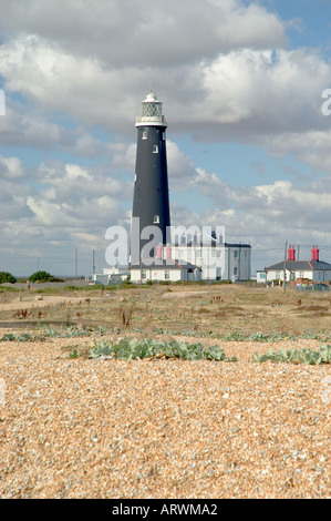 old black lighthouse on the beach at dungeness on the kent coast Stock ...