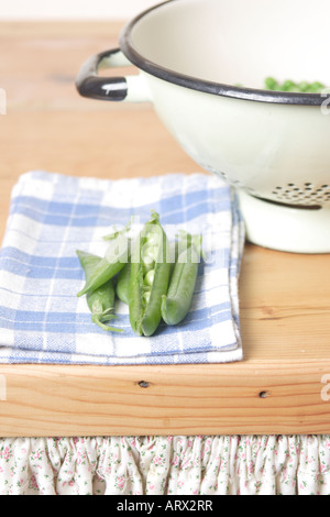 Raw Green Organic Snap Pea Shoots Ready to Eat Stock Photo - Alamy