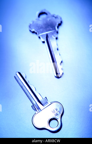 Two house keys, blue tone Stock Photo - Alamy