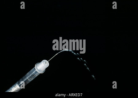 Squirting Syringe Needle With Medicine For Medical Intramuscular