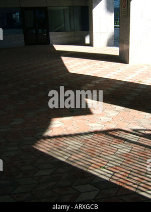 column shadows on tiled pavement Stock Photo - Alamy