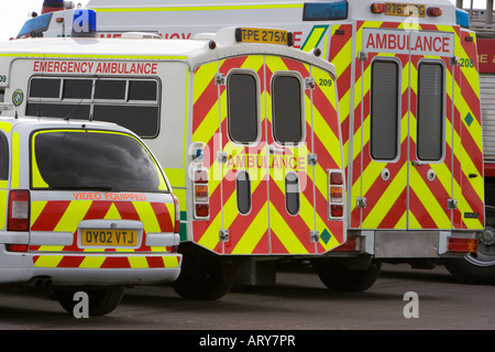 Back end of ambulances showing emergency vehicle striped markings Stock ...