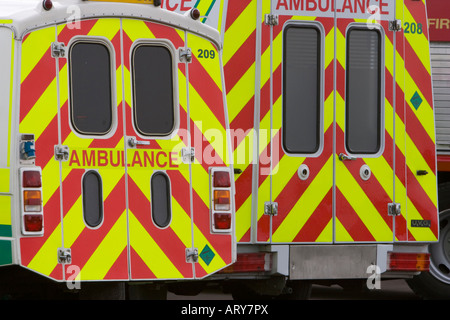 Back end of ambulances showing emergency vehicle striped markings Stock ...