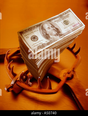 Trap with a stack of money. Dangerous risk for investment or deception ...