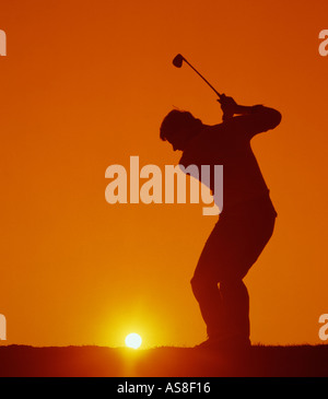Young man playing golf on the golf course Stock Photo - Alamy
