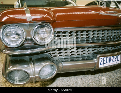Front lights and radiator grille of a 1960 pale blue Ford Anglia Stock ...