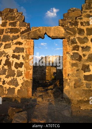 Stone doorways at the old Wickahoney stage stop frame the harsh ...
