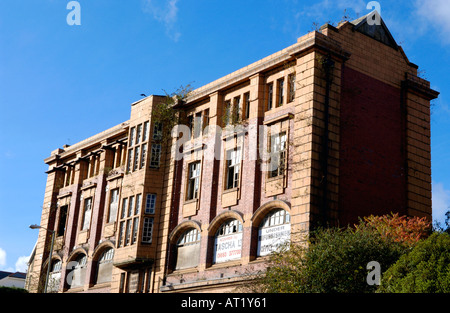 Derelict and boarded up Young Mens Christian Association YMCA building ...