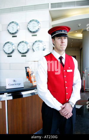 Commissionaire stand standing accommodation bell hop uniform hotel ...