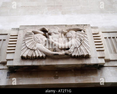 Eric Gill sculptural panel depicting "Ariel between wisdom and gaiety ...