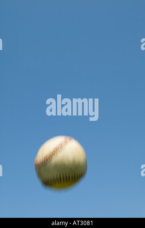 Baseball ball in the air. Close-up. Evening sunset. Blurred background ...