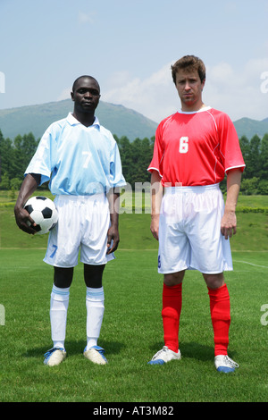 Two players from rival teams face off Stock Photo - Alamy