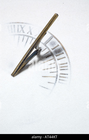 Sundial covered with sand Stock Photo - Alamy