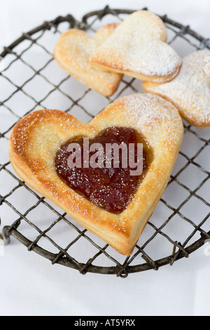 Background for Valentine's Day baking with hearts and flour Stock Photo ...