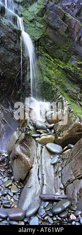 Small waterfall on the beach at Sandymouth, Cornwall, UK Stock Photo ...