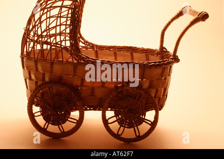 Miniature Wickerwork Pram Stock Photo - Alamy