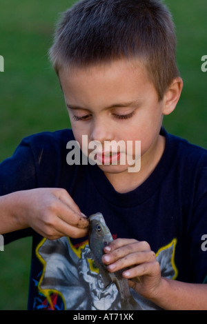 Taking the Hook Out Stock Photo - Alamy