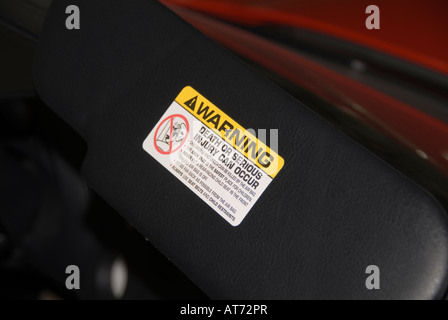 Car airbag warning sticker for on and off uses Stock Photo - Alamy