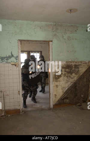 Police SWAT team entering room inside building Nebraska State Patrol ...