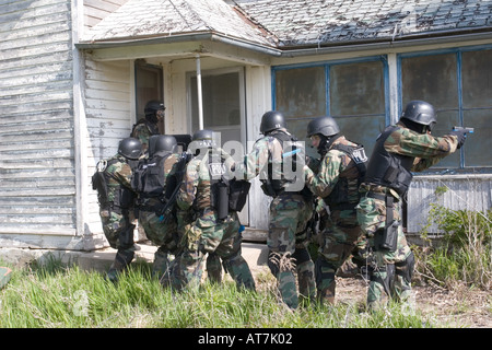 SWAT training. Moving in formation approaching a building Stock Photo ...