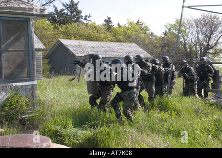 SWAT training. Moving in formation approaching a building Stock Photo ...