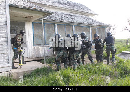 SWAT training. Moving in formation approaching a building Stock Photo ...