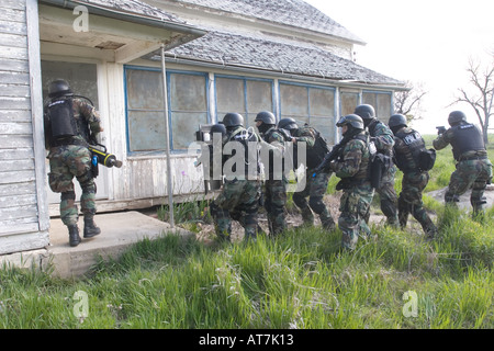 SWAT training. Moving in formation approaching a building Stock Photo ...
