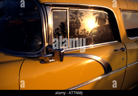 windows reflected in car wing mirror in italy Stock Photo - Alamy