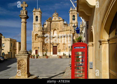 Church of the Visitation and red telephone box Gharb, Gozo Malta Stock ...