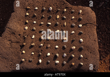 Konane game hawaiian checkers Stock Photo - Alamy