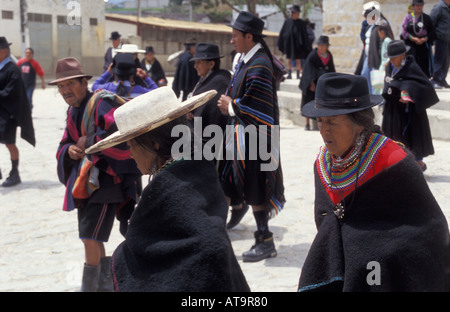 Indigenous people of Saraguro leaving the church after Sunday mass in ...