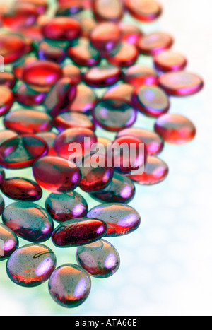 Glass pebbles on a light box Stock Photo - Alamy