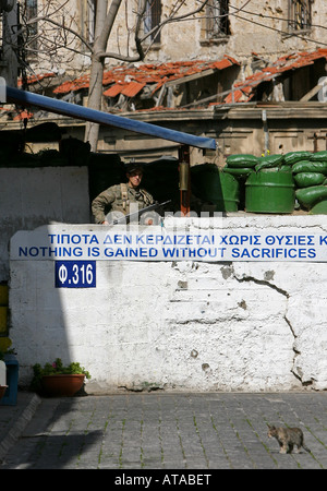 A Greek Cypriot soldier at the border with Turkish controlled Cyprus in ...