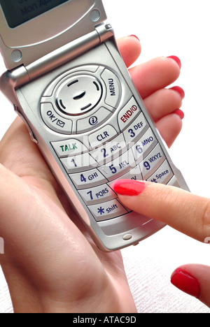 Closeup Of Womans Hand Dialing Telephone Stock Photo - Alamy