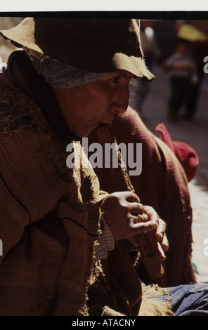 Native Quechua indian playing the quena traditional flute in Cuzco ...