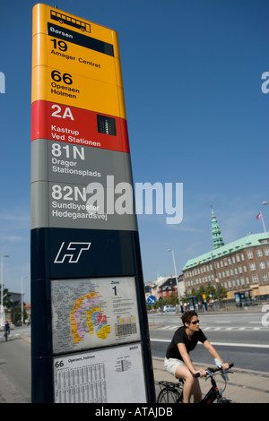 Copenhagen, Denmark; Bus stop with cyclist riding by Stock Photo - Alamy