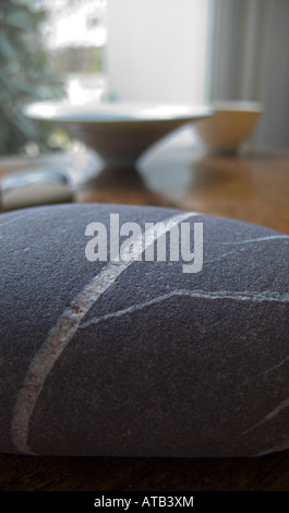 Still life with pebble and studio pottery Stock Photo - Alamy