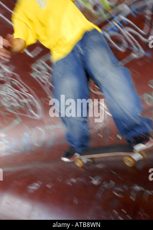 Motion blur, skateboard and balance with a sports man training outdoor ...