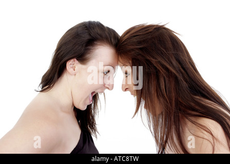 twin sisters screaming at one another Stock Photo - Alamy