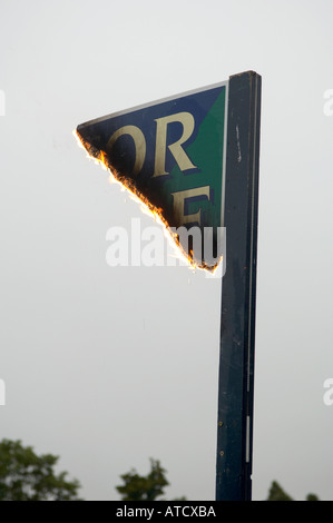 For sale sign on fire Stock Photo - Alamy