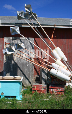 buoys leaning on wall in East Harbour Ingomar, Nova Scotia, Canada ...